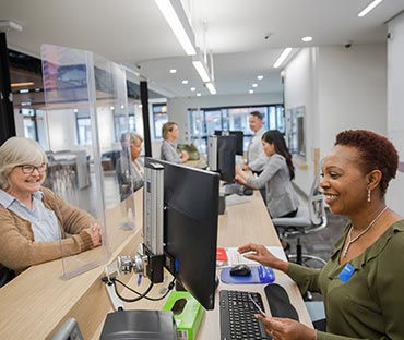 People Working In Bank